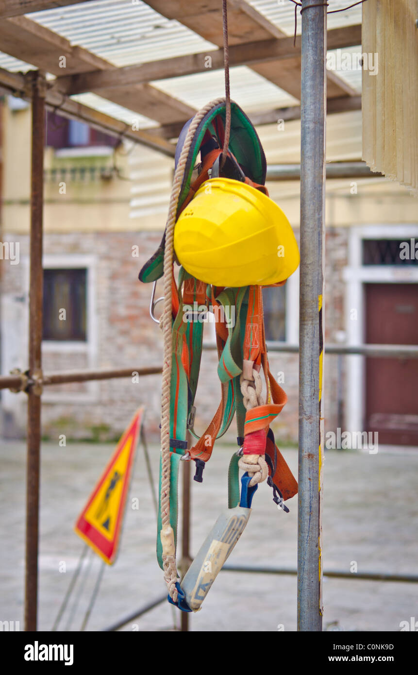 builders Hard hat and safety harness on site Stock Photo - Alamy