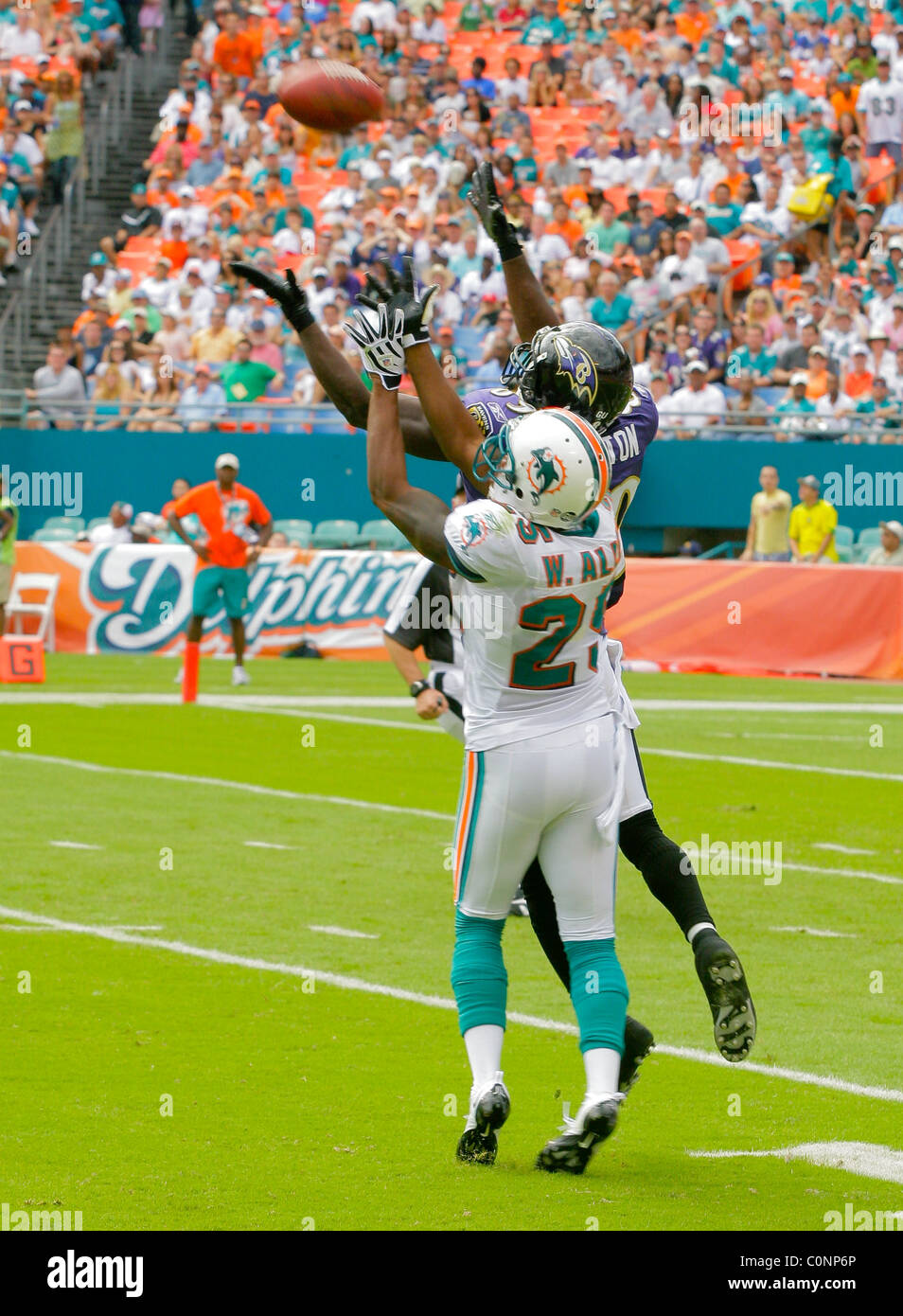 Will Allen of the Miami Dolphins breaks up a play as the Baltimore ...