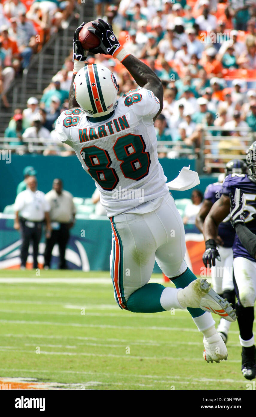David Martin of the Miami Dolphins catches the ball as the Baltimore ...