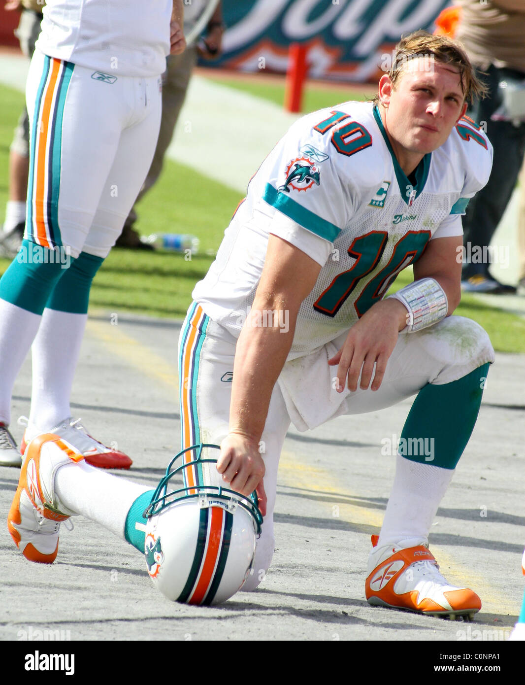 Chad Pennington of the Miami Dolphins looks on as the Baltimore Ravens ...