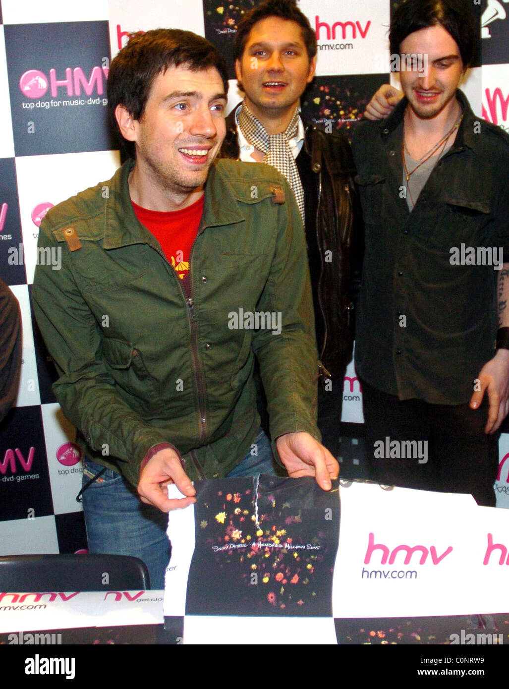 Snow Patrol meeting their fans during a signing of their new studio ...
