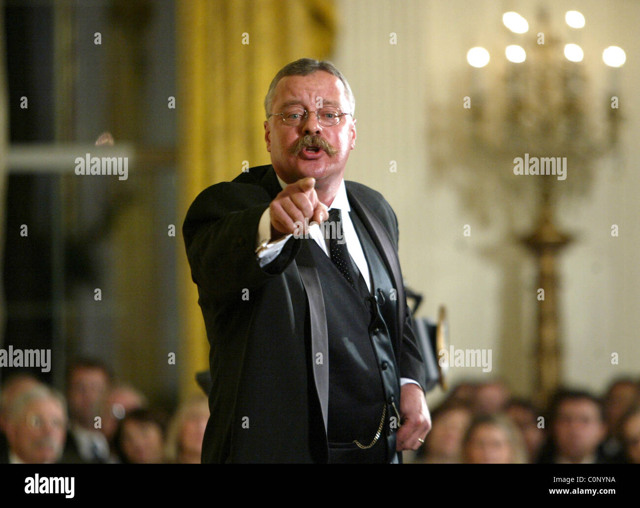 President Theodore Roosevelt character actor speaks at a gathering in ...