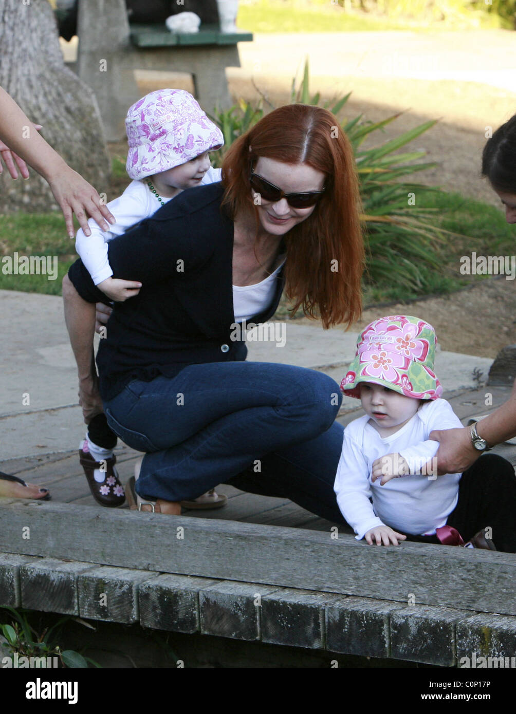 Marcia Cross takes her daughters Savannah and Eden to her local park ...
