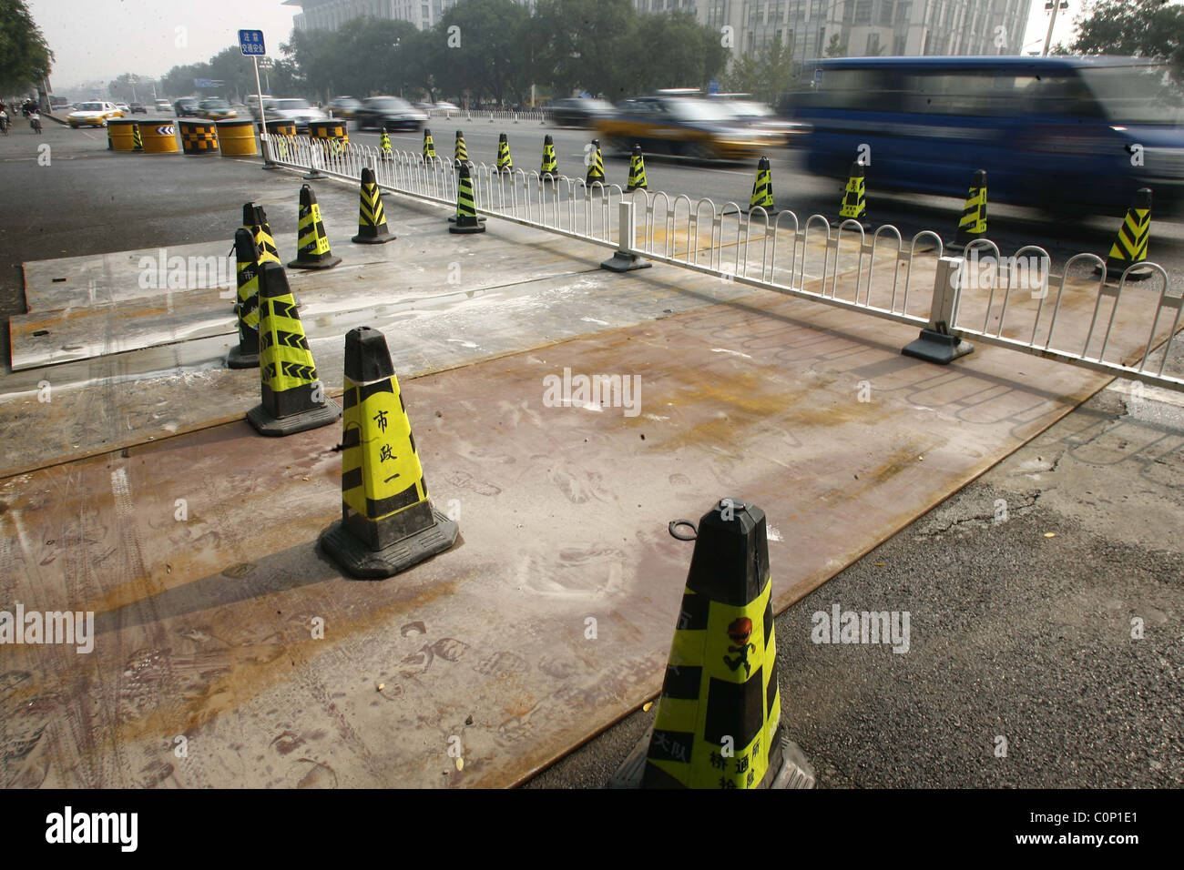FIXING A HOLE... Construction workers acted quickly when an enormous ...