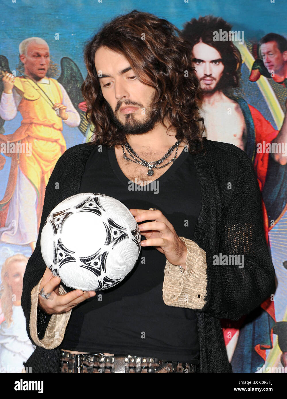 Russell Brand at a photocall for his book 'Articles of faith' held at ...