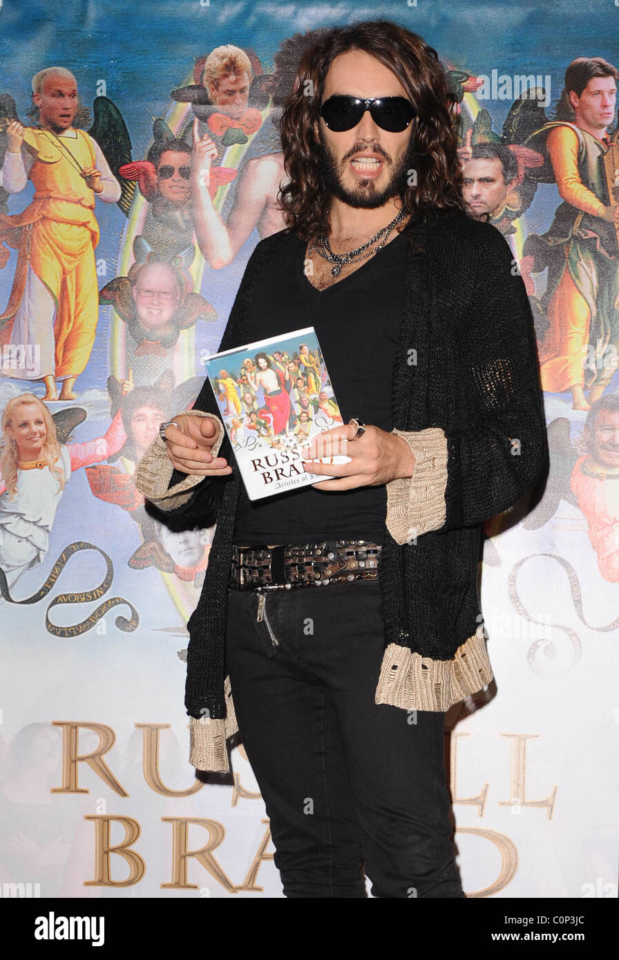 Russell Brand at a photocall for his book 'Articles of faith' held at ...
