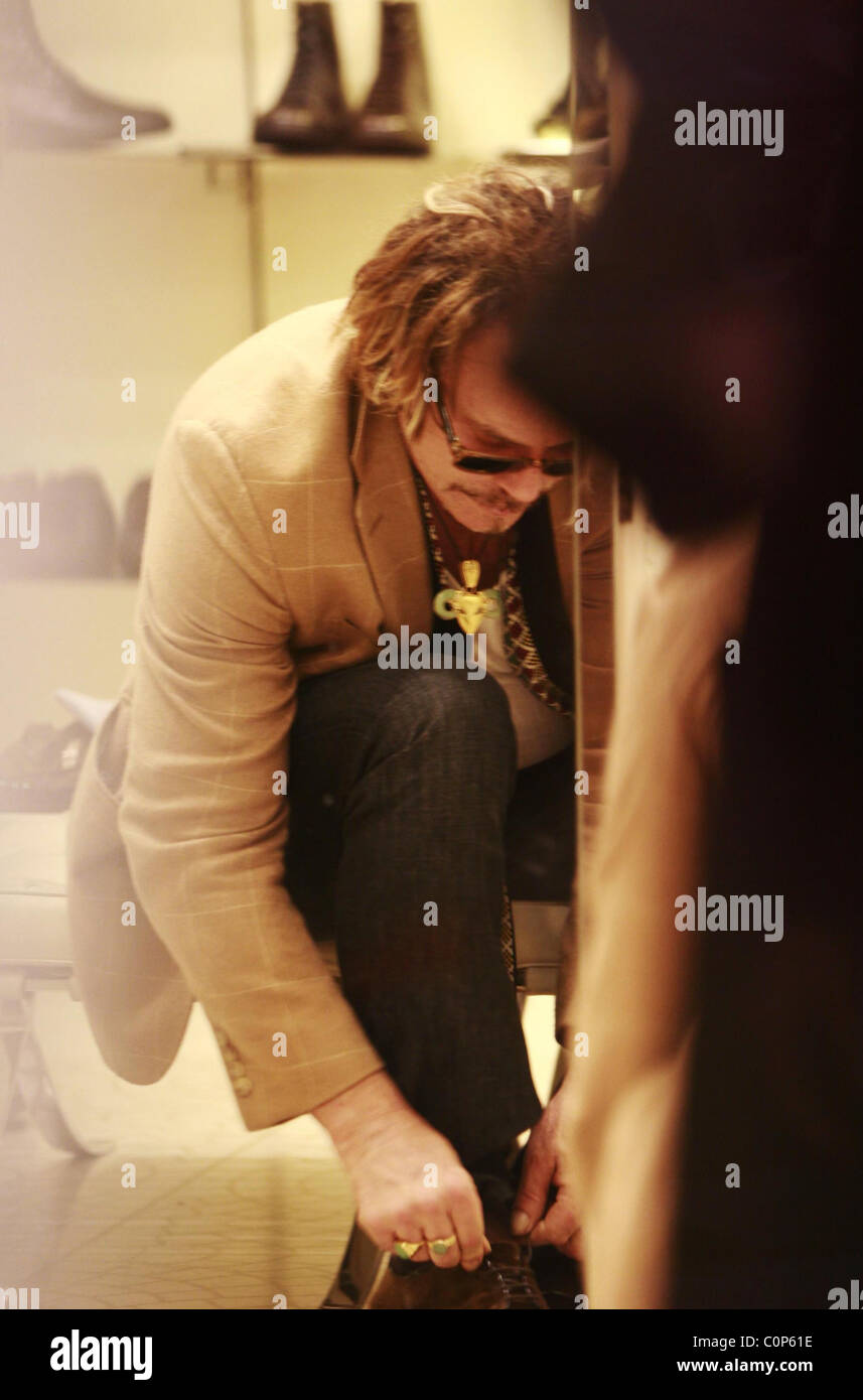 Mickey Rourke goes for an evening stroll along the Via Condotti with ...