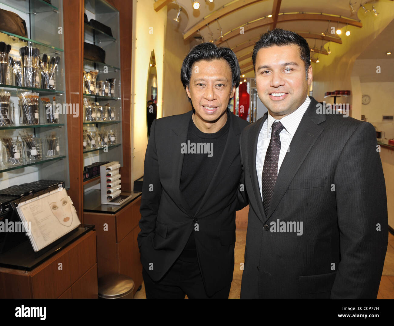 Phillip Ing and Karim Karsan A cheque for $75,000 is presented on ...