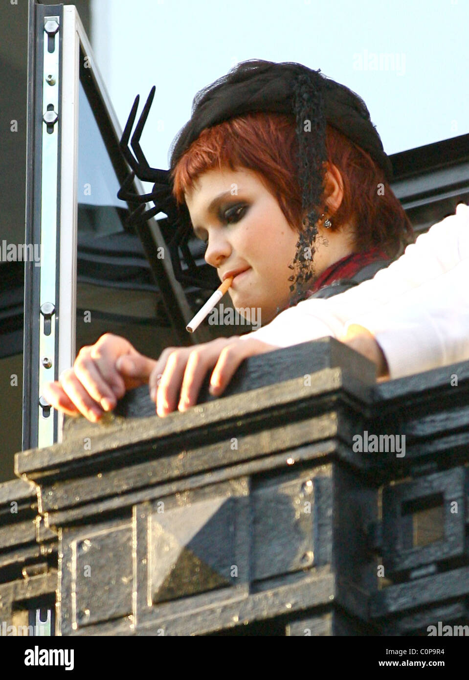Pixie Geldof having a cigarette on the balcony of the Swarovski ...