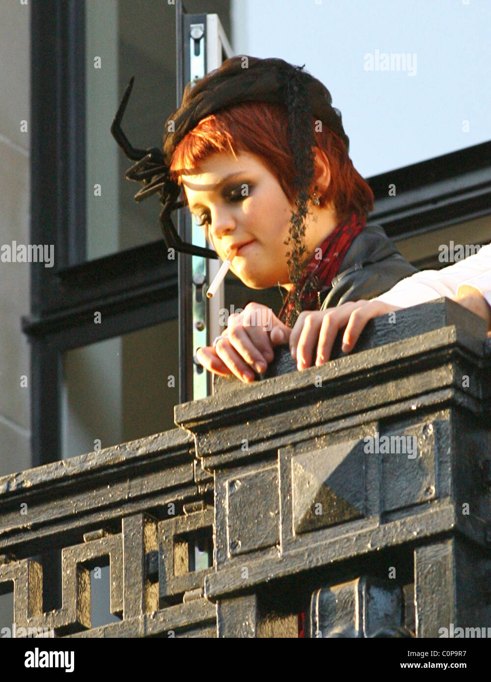 Pixie Geldof having a cigarette on the balcony of the Swarovski ...
