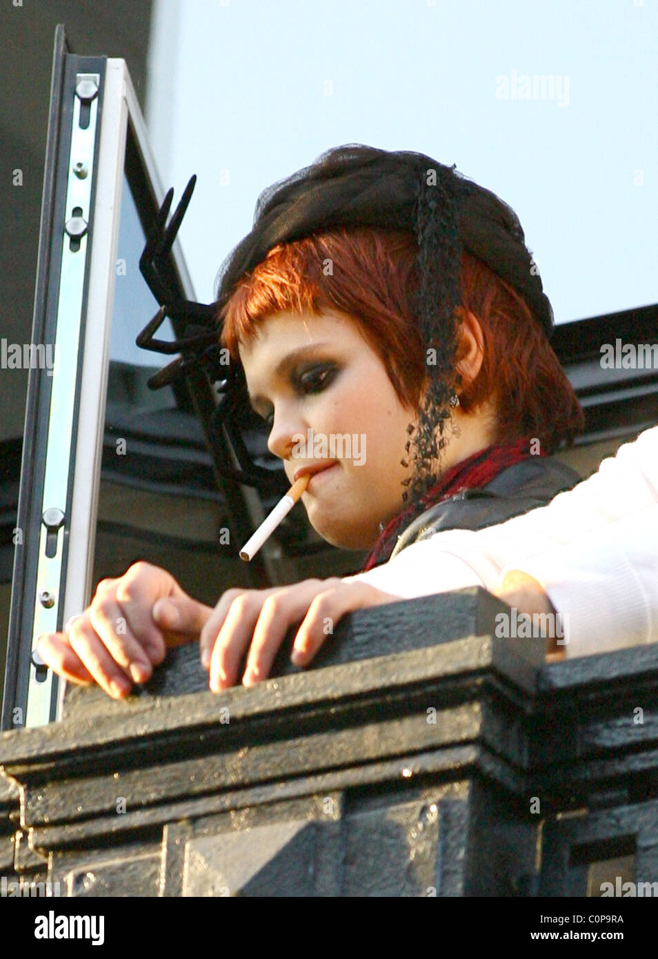 Pixie Geldof having a cigarette on the balcony of the Swarovski ...