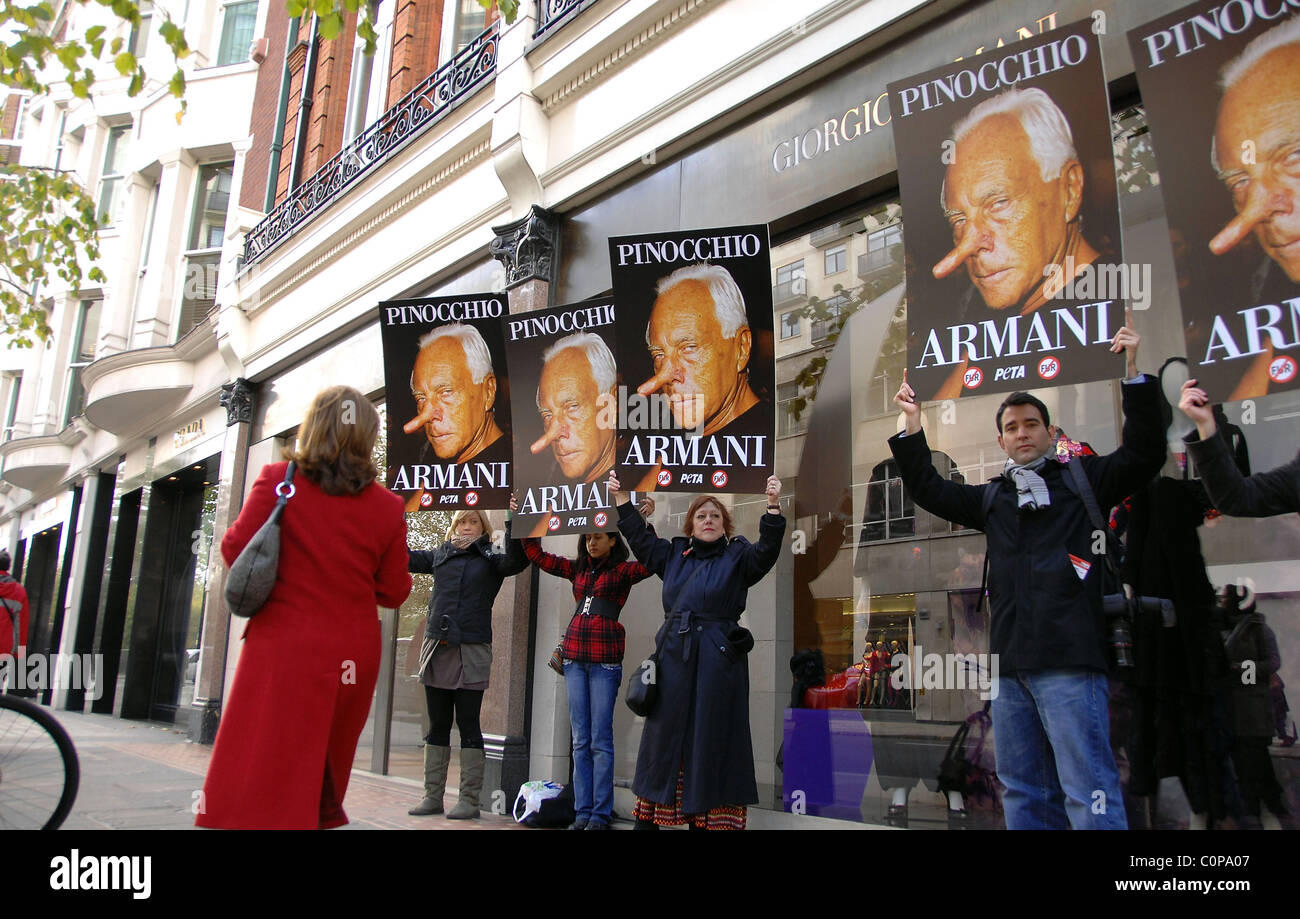 Members of PETA stand outside Giorgio Armani store on Sloane Street as ...