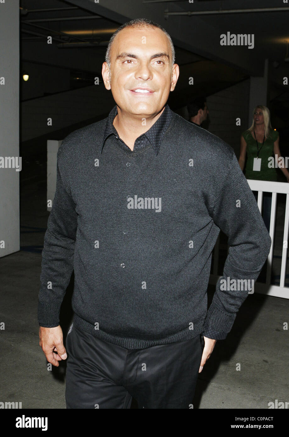 Christian Audigier enjoys his success at the Unity Fashion show held at ...