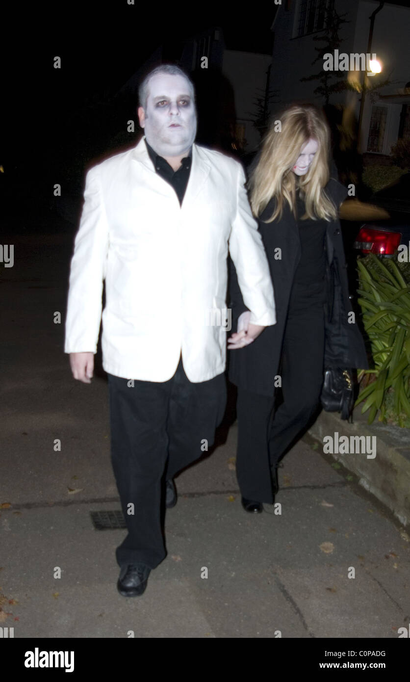 Chris Moyles and Guest arriving at Jonathan Ross's Halloween Party ...