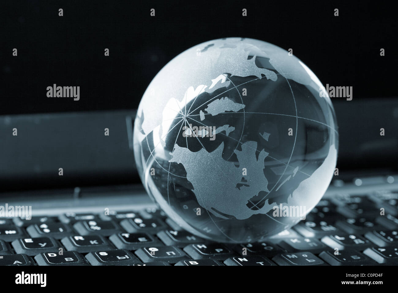 Globe and keyboard Stock Photo - Alamy