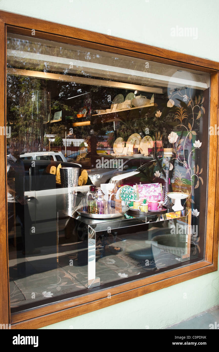 Souvenirs displayed at a store window, New Delhi, India Stock Photo - Alamy