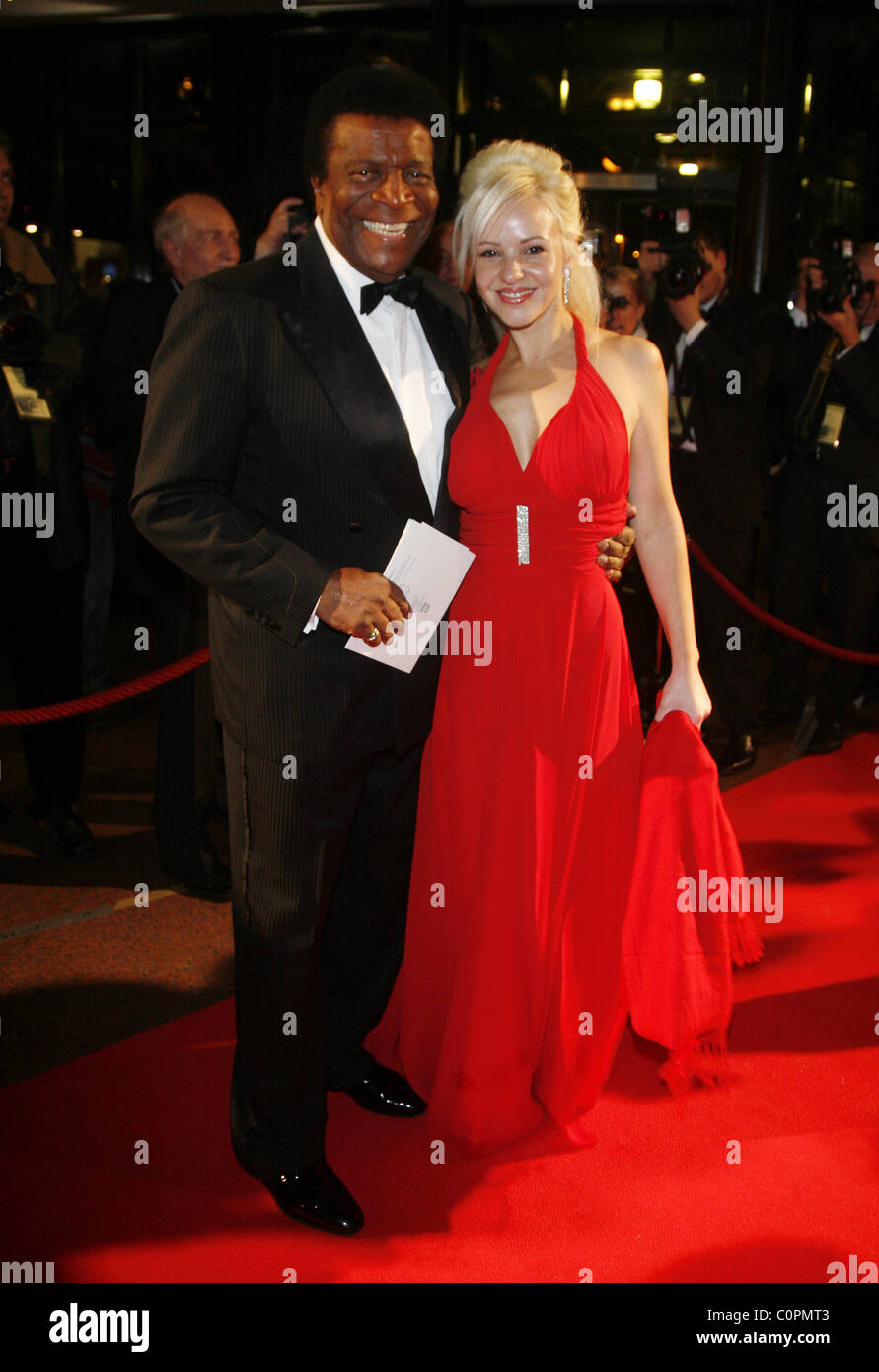Robert Blanco, girlfriend Luzandra Strassburg UNESCO charity gala at ...