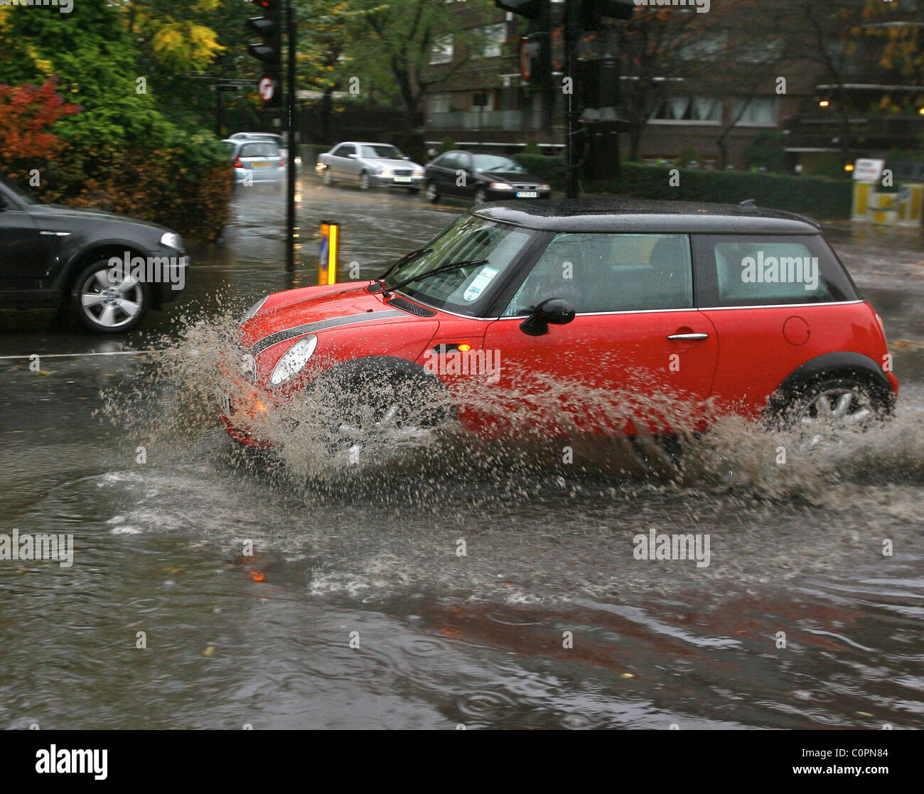 Heavy rain leads to flooding on the roads of north London London ...