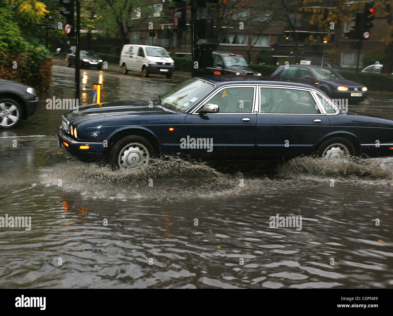 Heavy rain leads to flooding on the roads of north London London ...