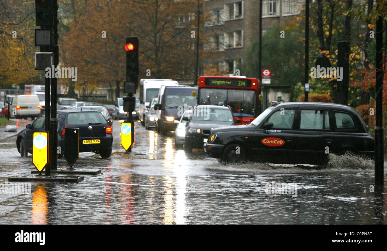 Heavy rain leads to flooding on the roads of north London London ...