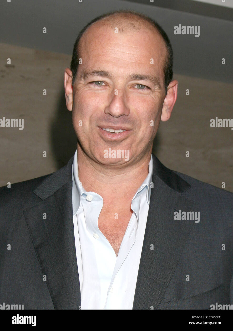 Howard Gordon arriving at a photo exhibit featuring pictures taken ...