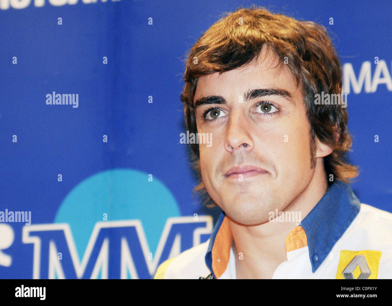 Fernando Alonso Poses at a press conference with Mutua Madrilena where ...
