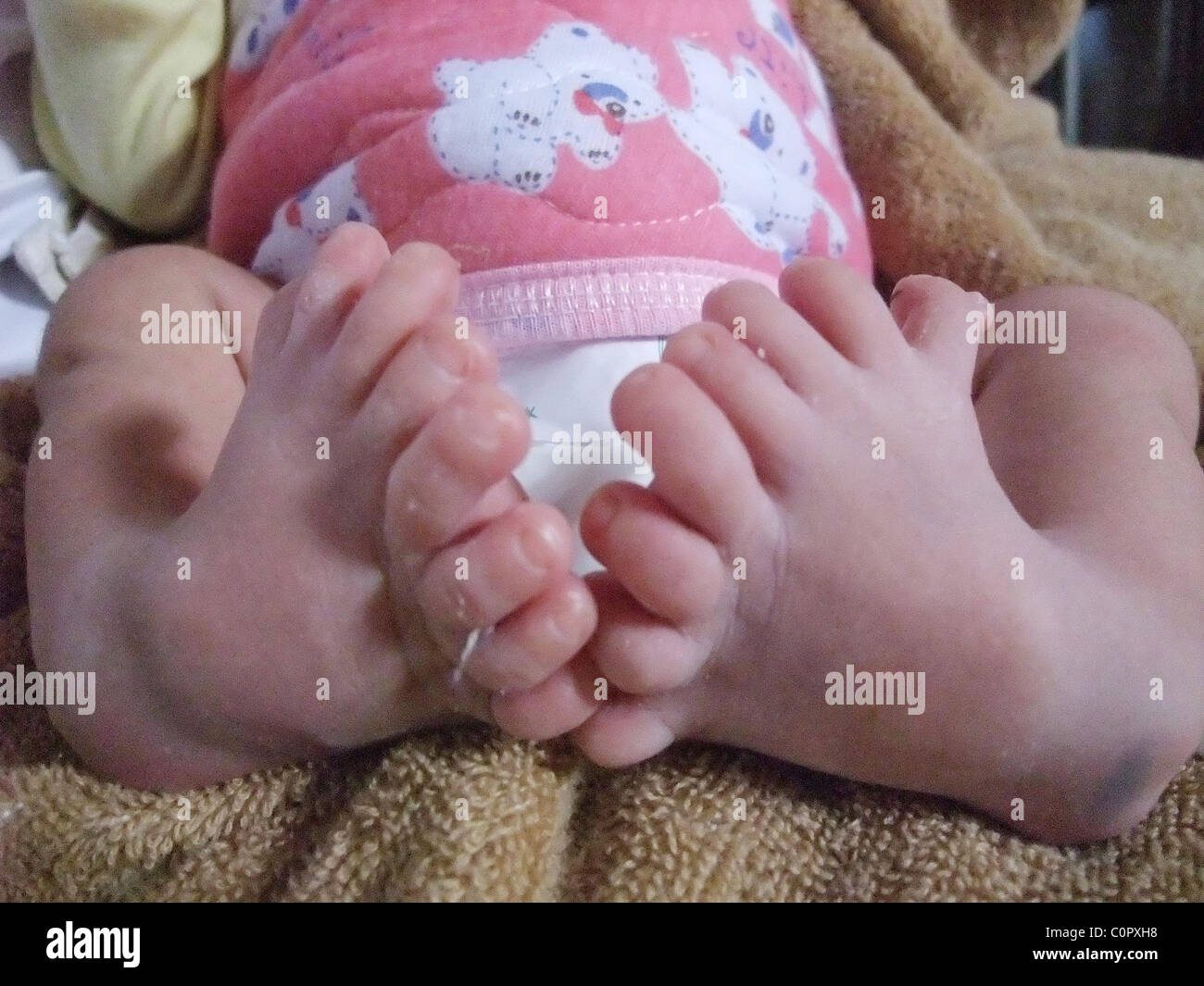 THAT'S SOME FEET! This little tot will be treading carefully when he ...