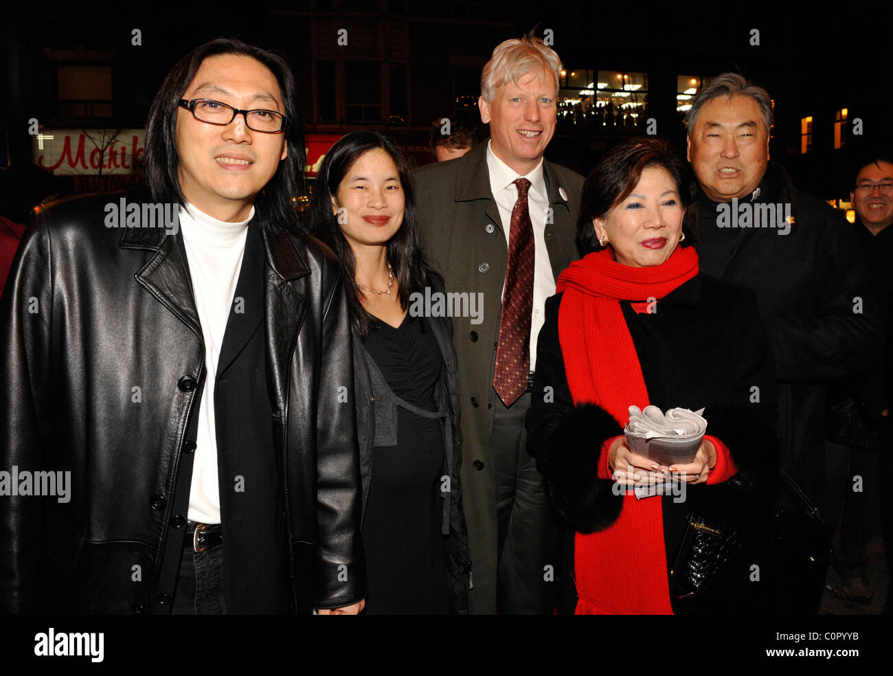 Filmmaker Kenneth Bi(L) Mayor David Miller (M), and friends attend the ...
