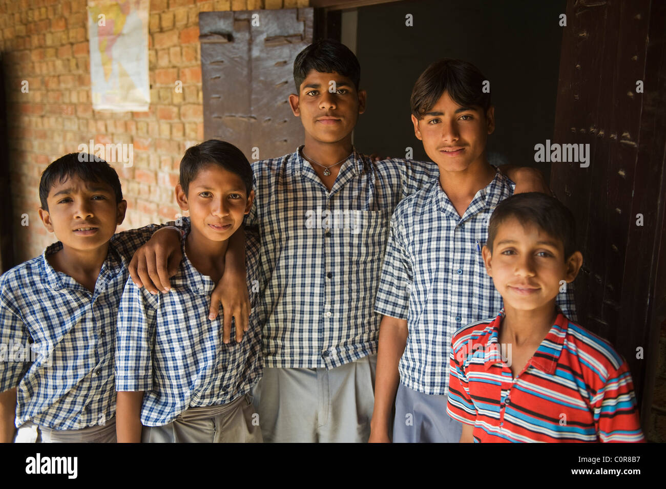 Portrait of five boys in a classroom Stock Photo - Alamy