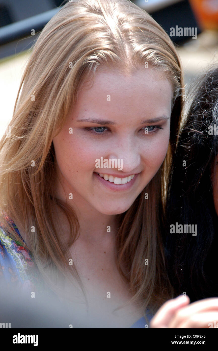 Emily Osment Signs autographs on the set of 'Hannah Montana: The Movie ...