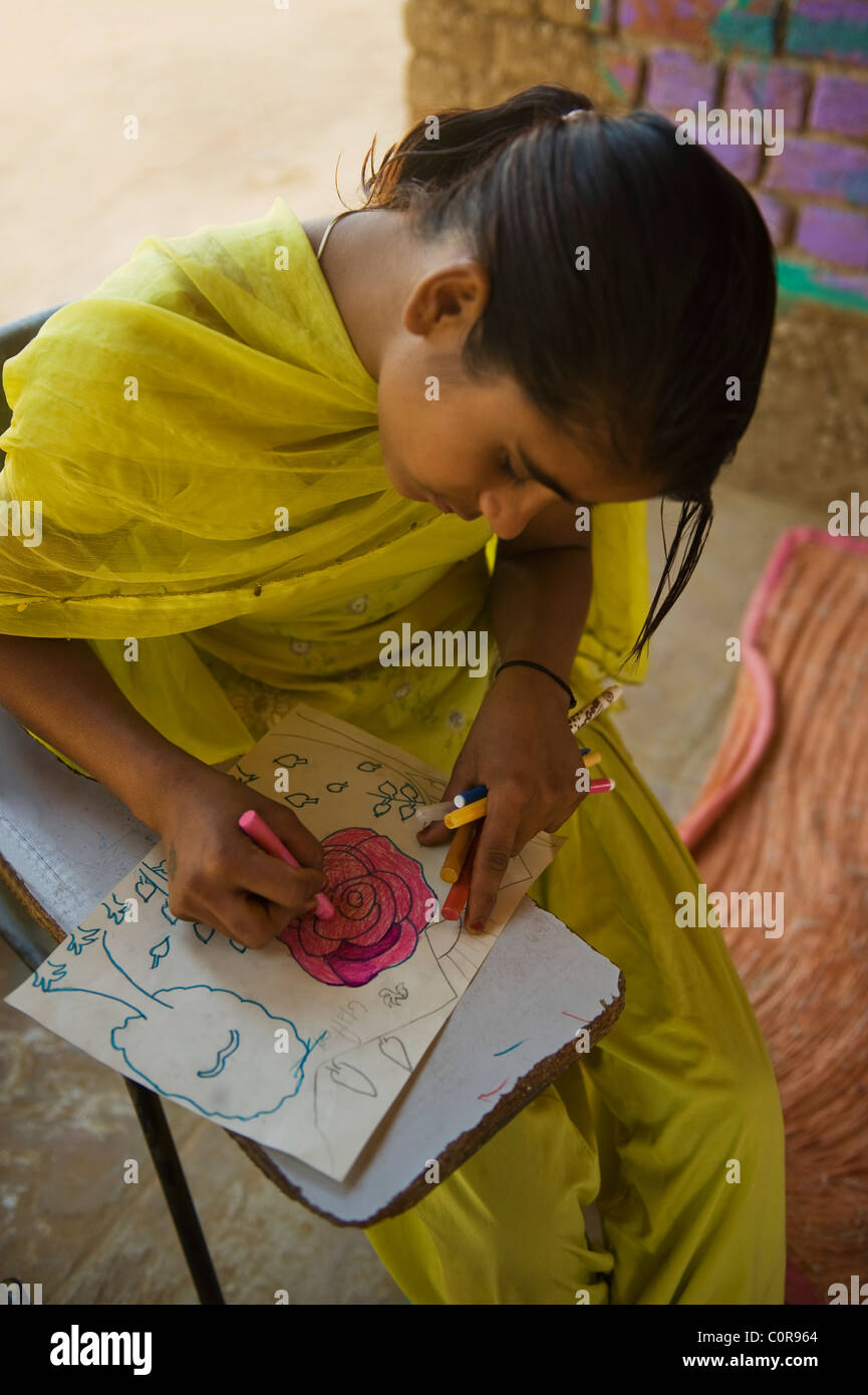 Girl making a drawing Stock Photo - Alamy