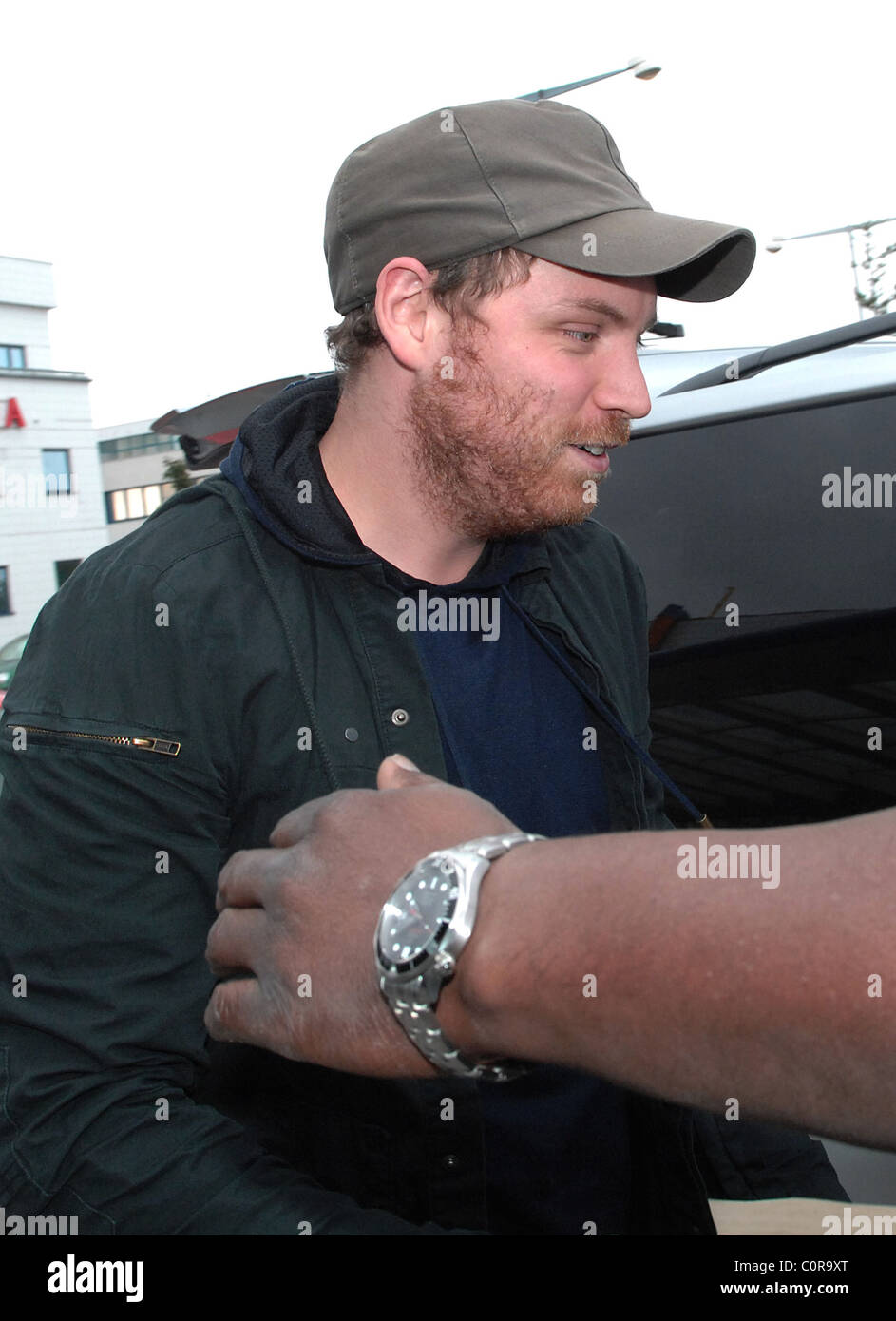 Jonny Buckland of Coldplay arriving at Prague airport Prague, Czech ...