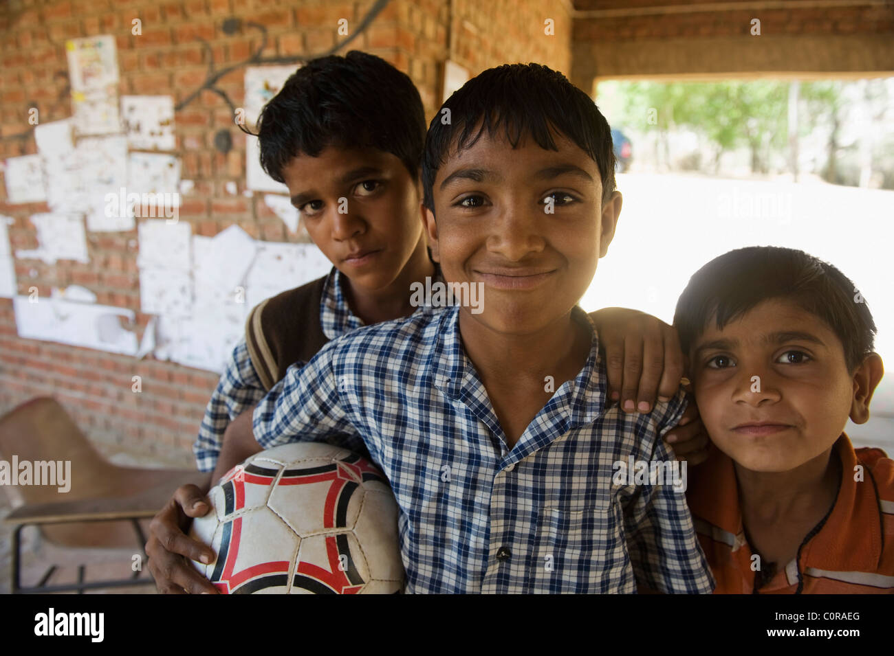 Portrait of three school children Stock Photo - Alamy