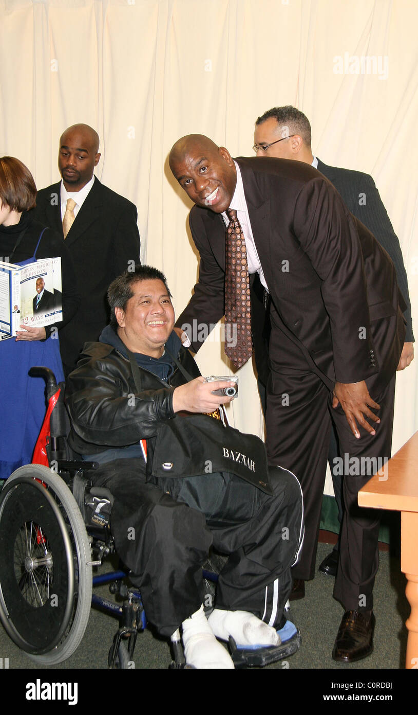 Earvin 'Magic' Johnson signing for his book '32 Ways to be a Champion ...