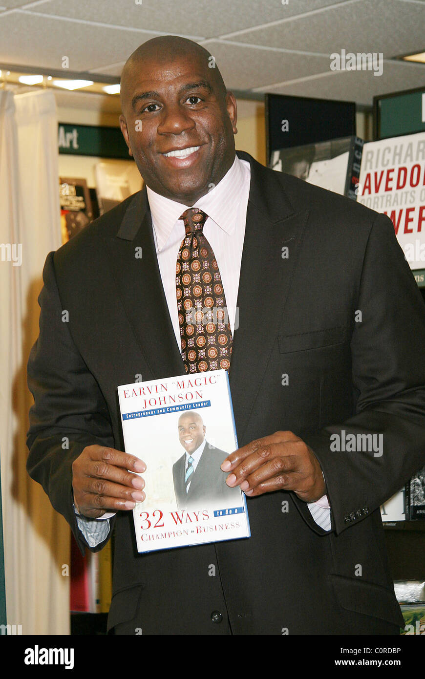 Earvin 'Magic' Johnson signing for his book '32 Ways to be a Champion ...