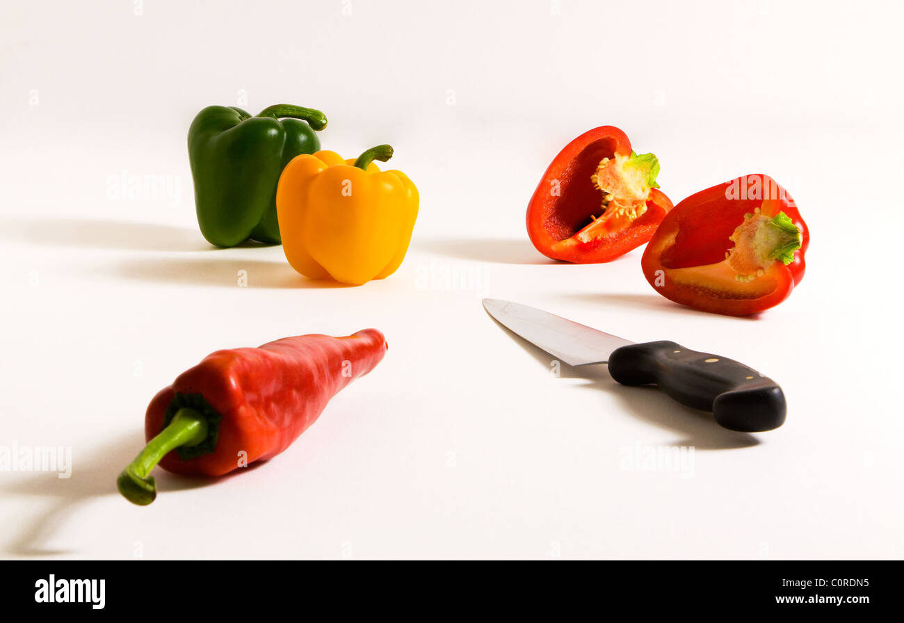 Peppers and knife Stock Photo - Alamy