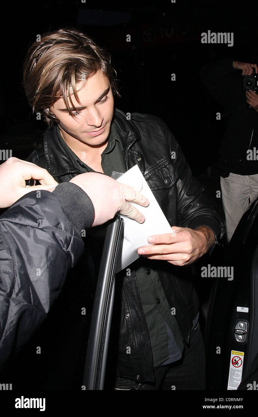 Zac Efron leaving a Lakers game at the Staples center Los Angeles ...