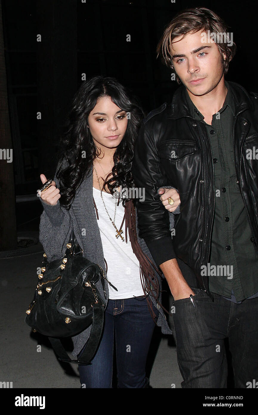 Vanessa Hudgens and Zac Efron leaving a Lakers game at the Staples ...