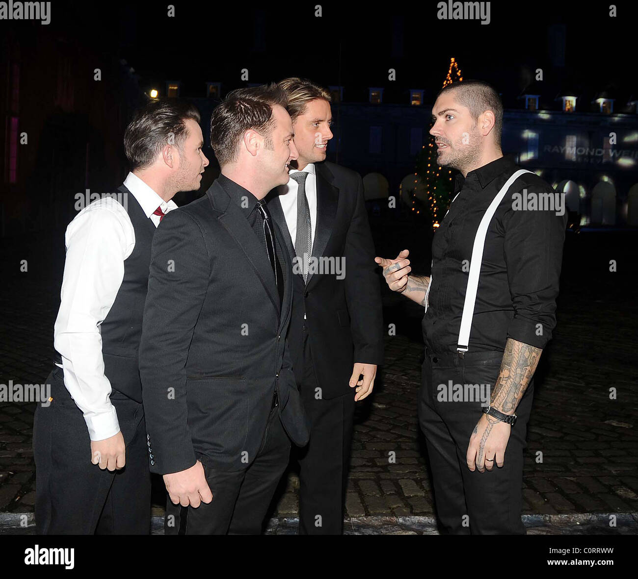 Stephen Gately, Keith Duffy, Mikey Graham and Shane Lynch talking Keith ...