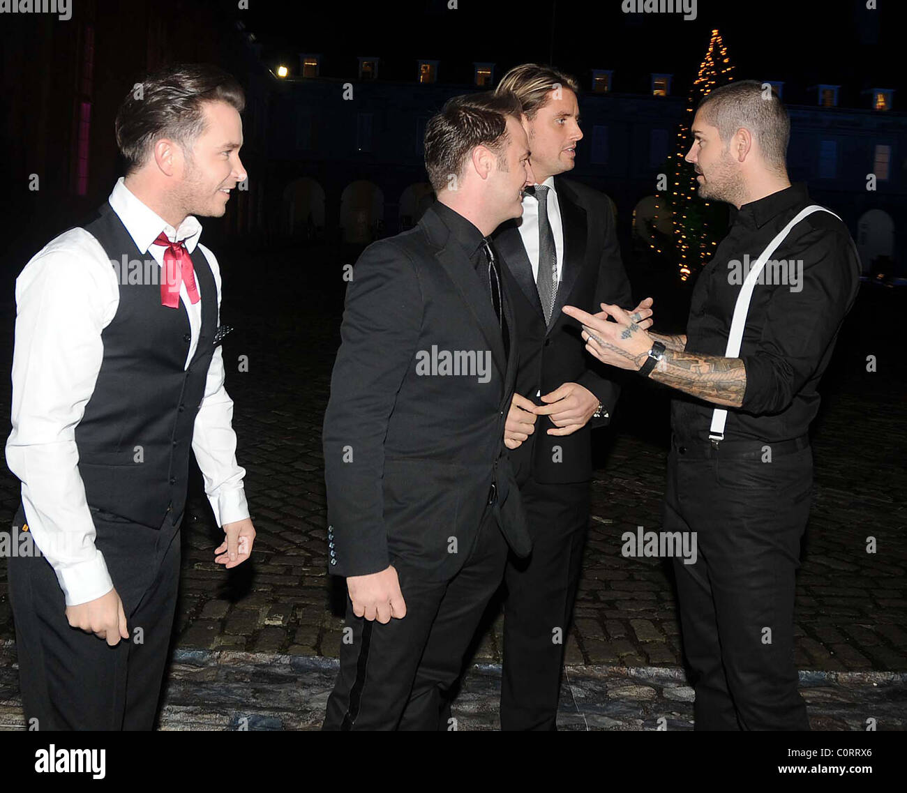 Stephen Gately, Keith Duffy, Mikey Graham and Shane Lynch talking Keith ...