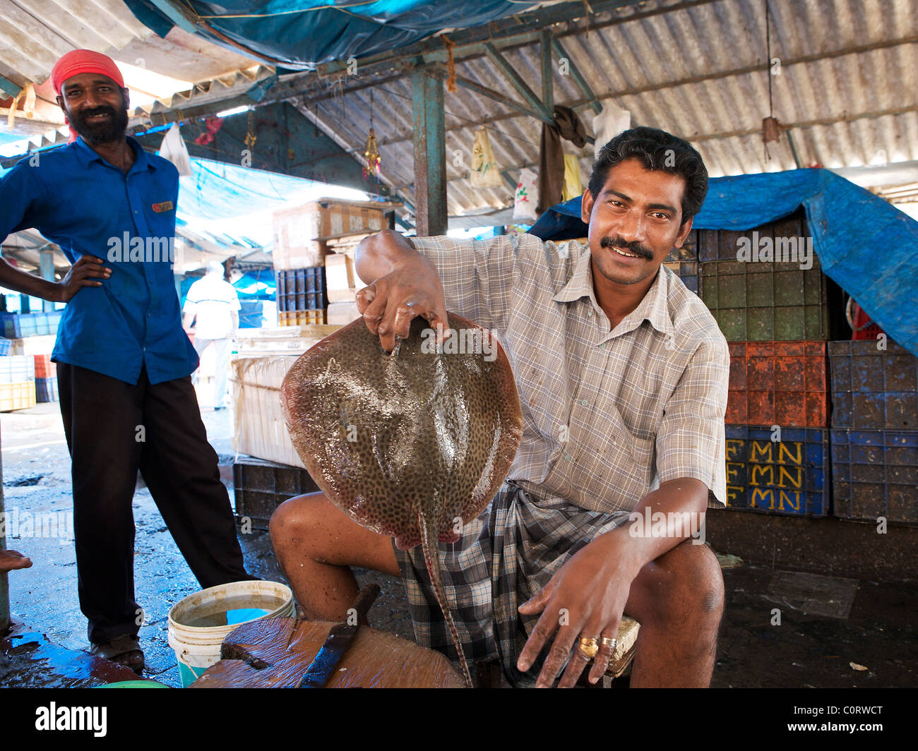 Fort Cochin Market Kerala India A Keralite Man Holds A Freshly