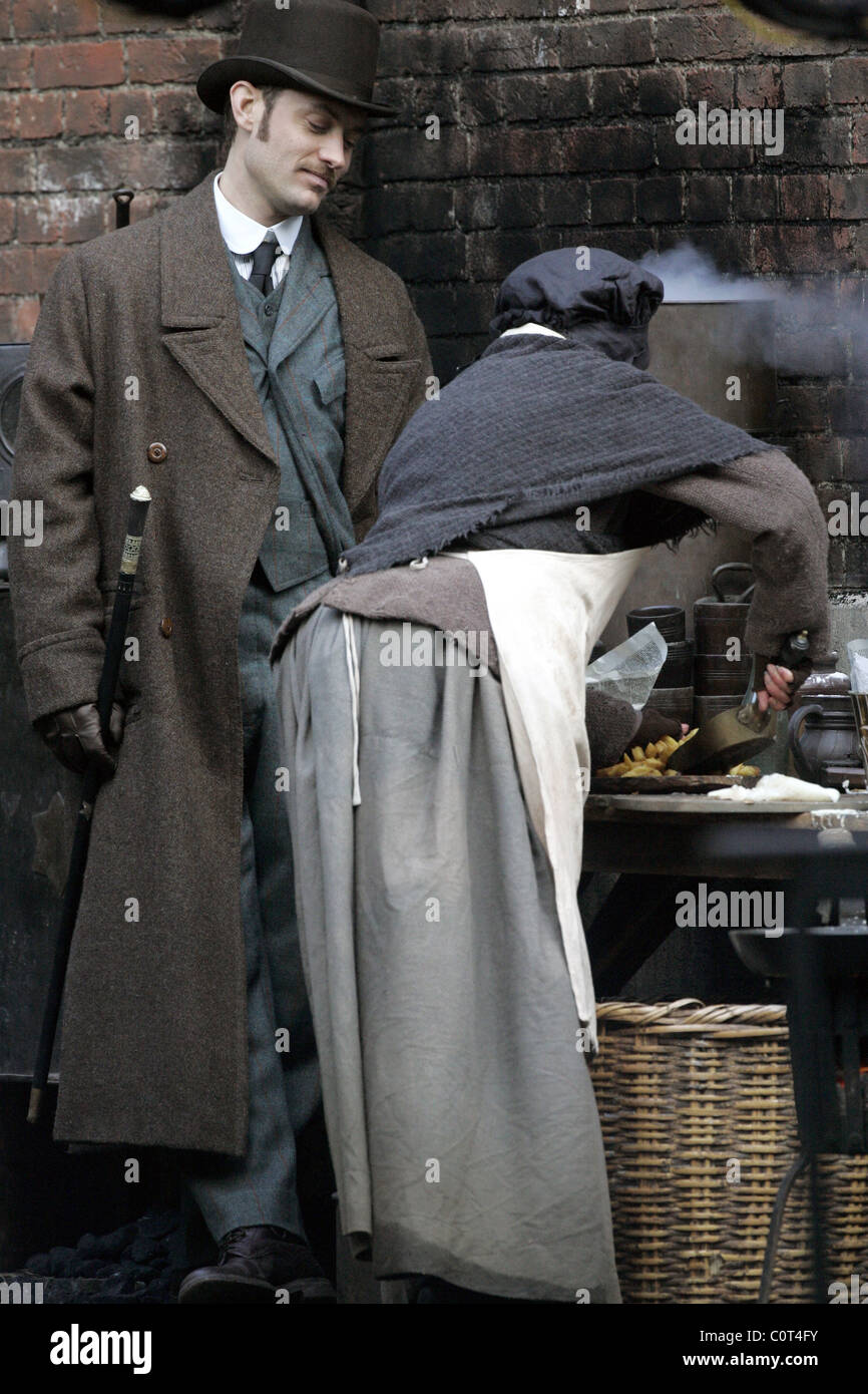 Jude Law filming on the set of Sherlock Holmes London, England - 21.12. ...