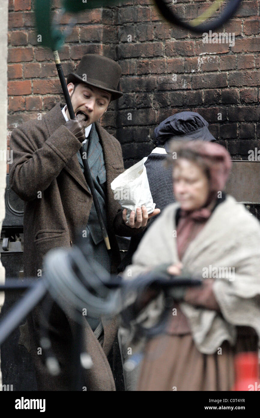 Jude Law filming on the set of Sherlock Holmes London, England - 21.12. ...
