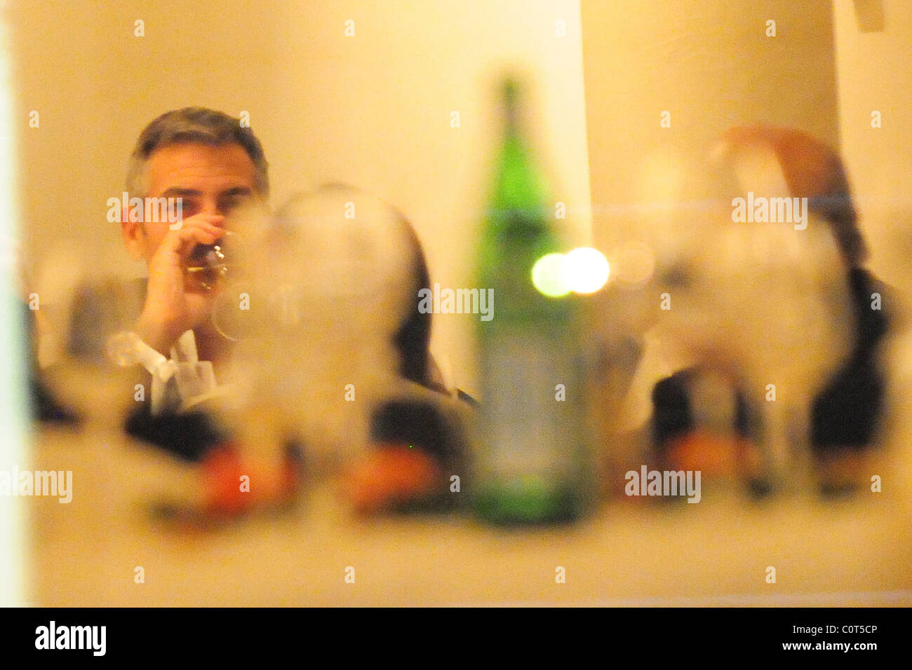 George Clooney having dinner at Bocca di Bacco restaurant after German ...