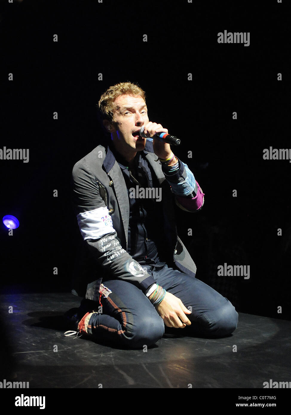 Chris Martin of Coldplay performing at the O2 Arena London, England ...