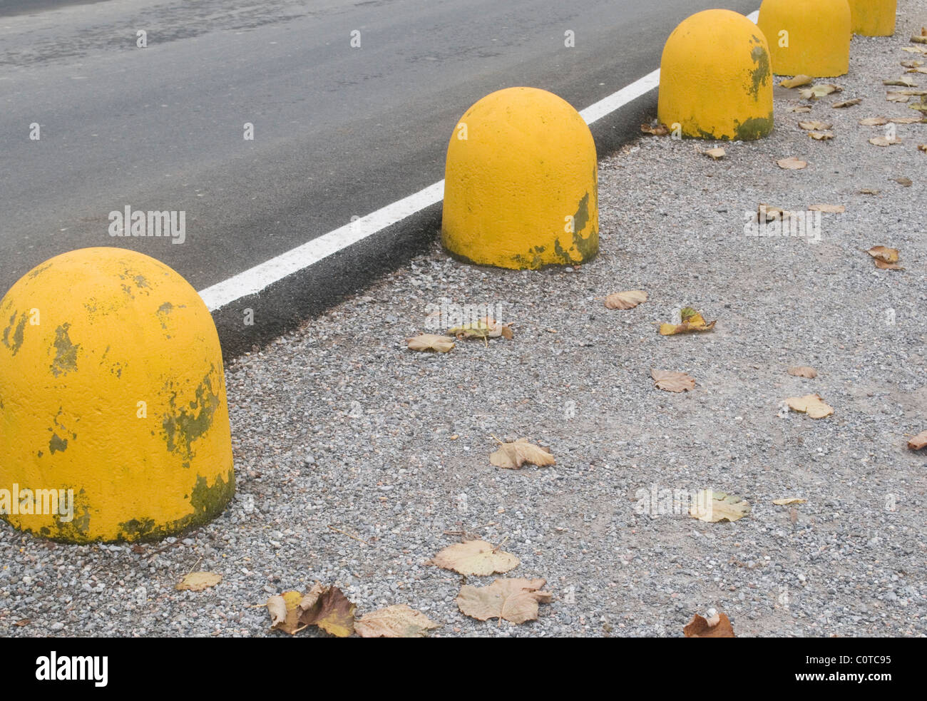 Row of concrete bollards hi-res stock photography and images - Alamy