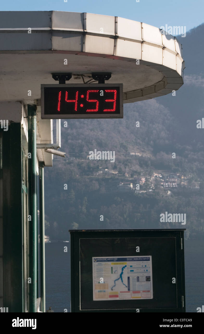 clock at ferry stand - lake como -italy Stock Photo - Alamy