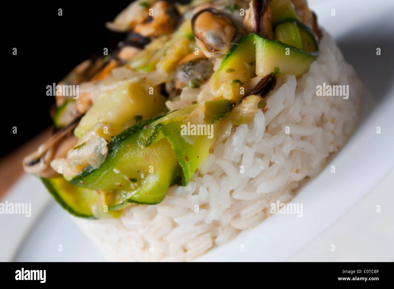 mussel and rice cooking Stock Photo - Alamy