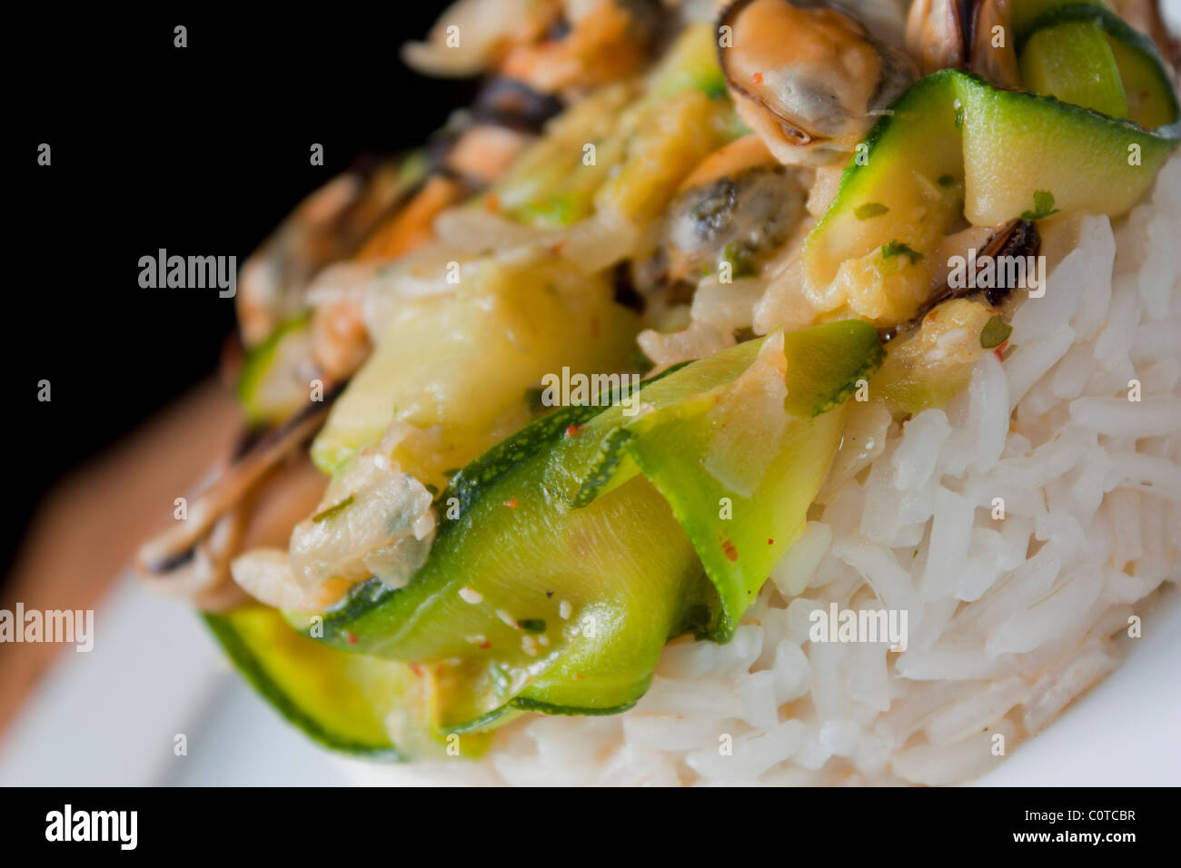 mussel and rice cooking Stock Photo - Alamy