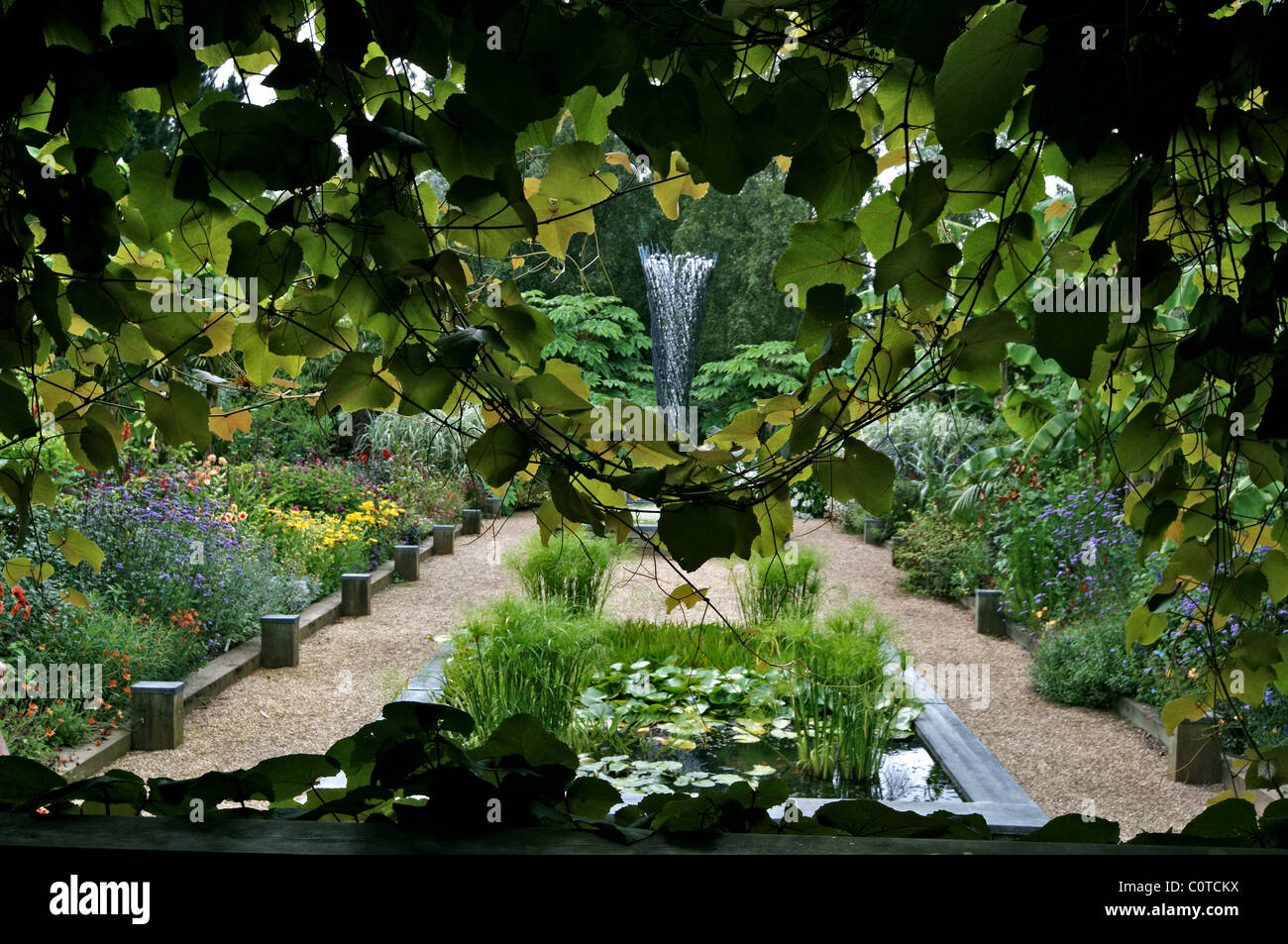 A view into the sunken garden with flowing water feature at East Ruston ...
